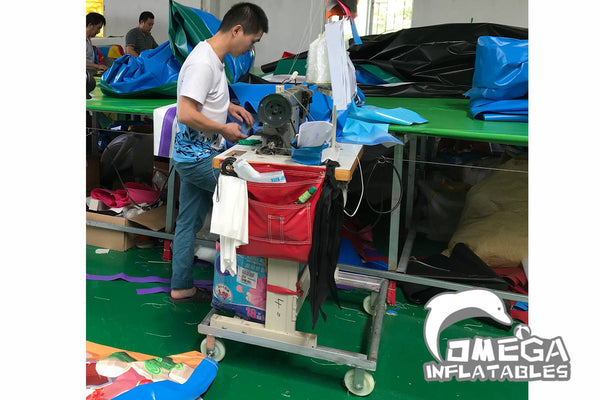 Omega Inflatables Factory - Sewing Machine with Wheels